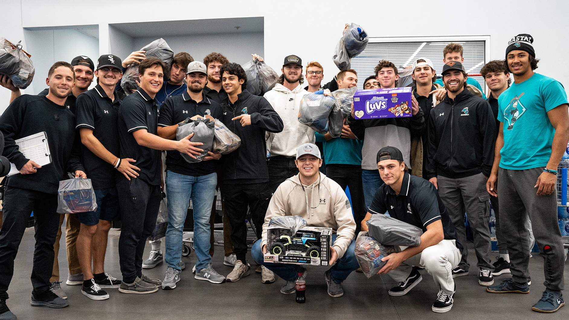 Coastal Baseball Participates in Adopt | The Coastal Family Experience